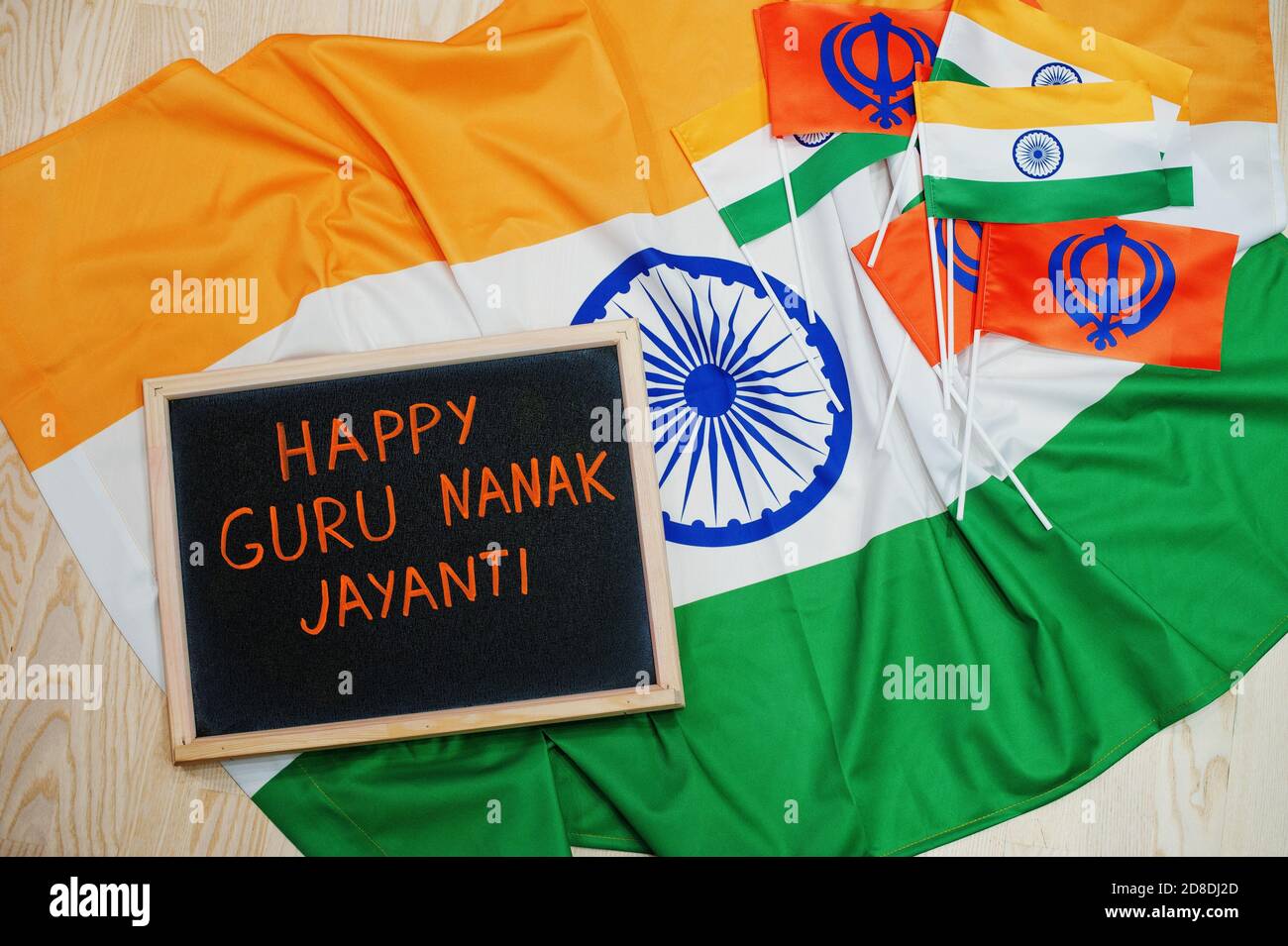 Happy Guru Nanak Jayanti theme. Board with flags Stock Photo - Alamy