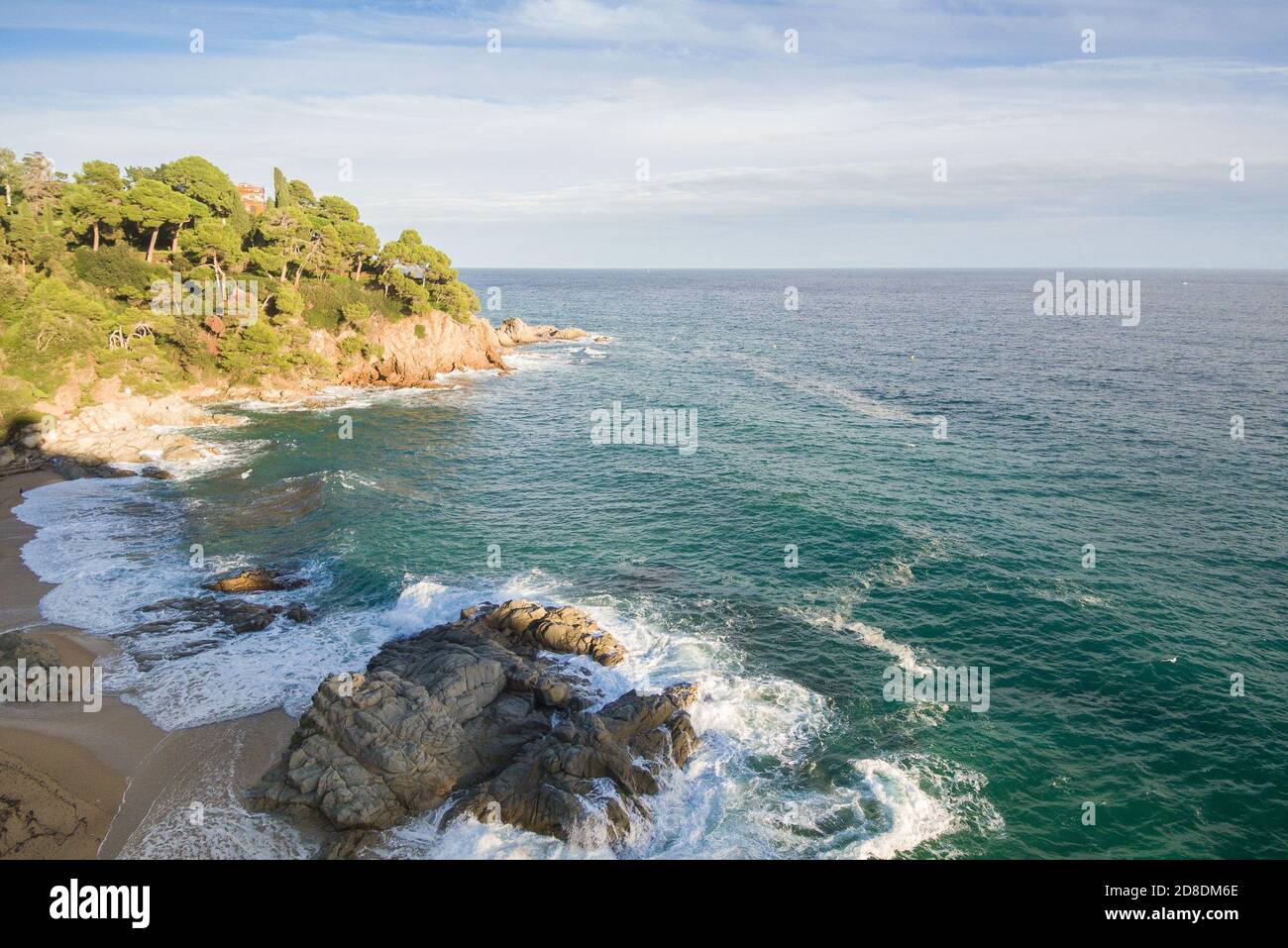 Aerial views of the Costa Brava in Catalonia. Beach full of rocks and ...