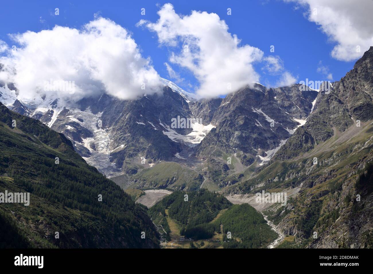 Peaks of Monte Rosa, Italy, with blue sky and white clouds Stock Photo ...