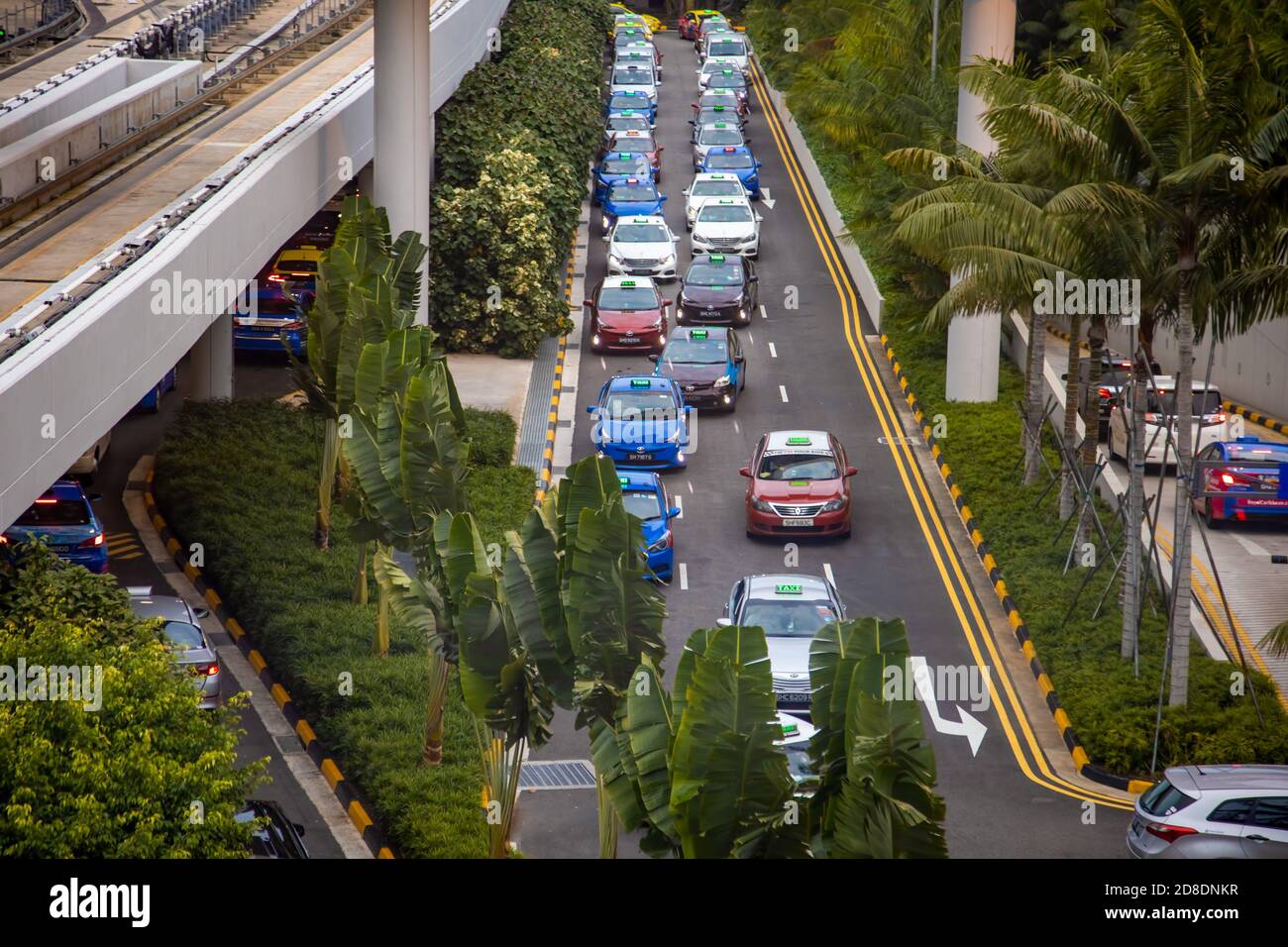SINGAPORE - MARCH 3, 2020: traffic jam queue of taxi cars at changi ...