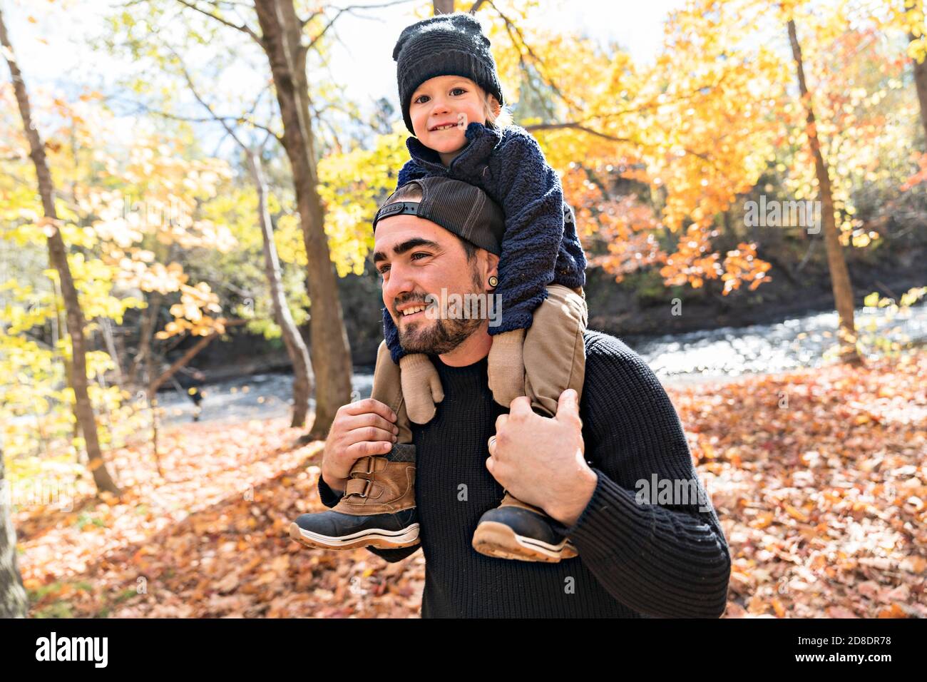 Happy family father and child boy in the autumn leaf fall in park Stock ...