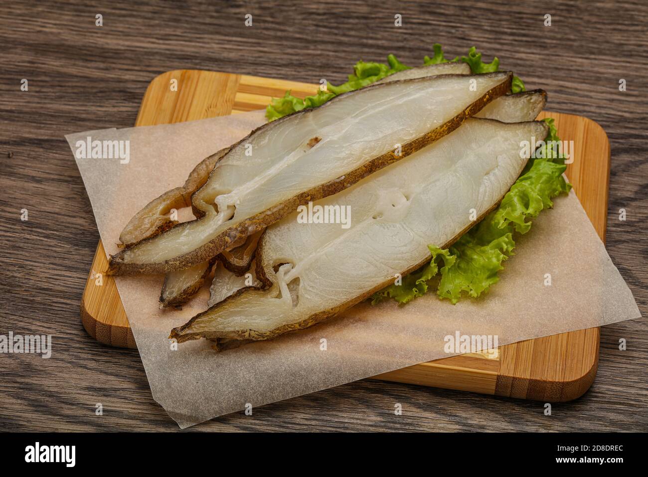 Delicous smoked halibut fish slices snack Stock Photo - Alamy
