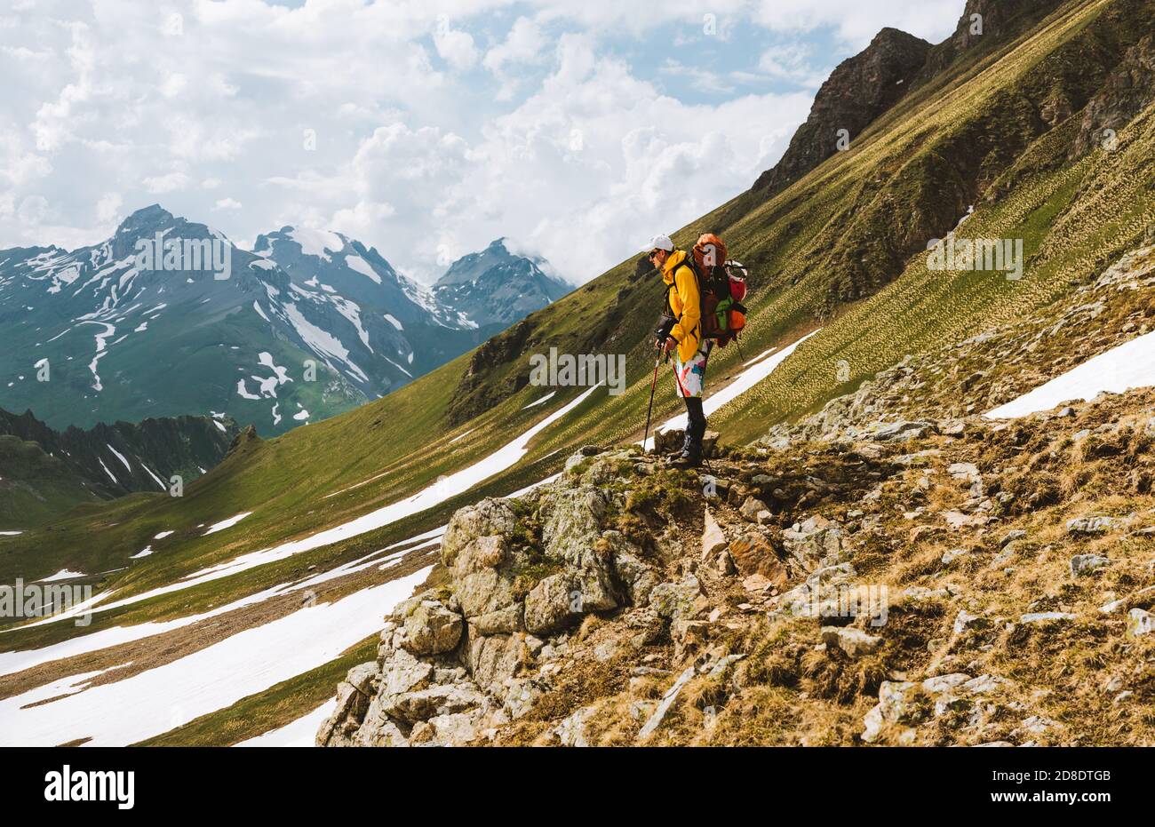 Achieving success through mountain hiking hi-res stock photography and ...