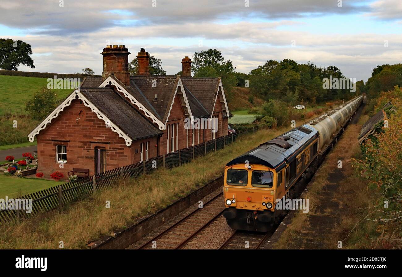 GBRF Diesel locomotive 66717 passes the closed station at Cumwhinton in ...