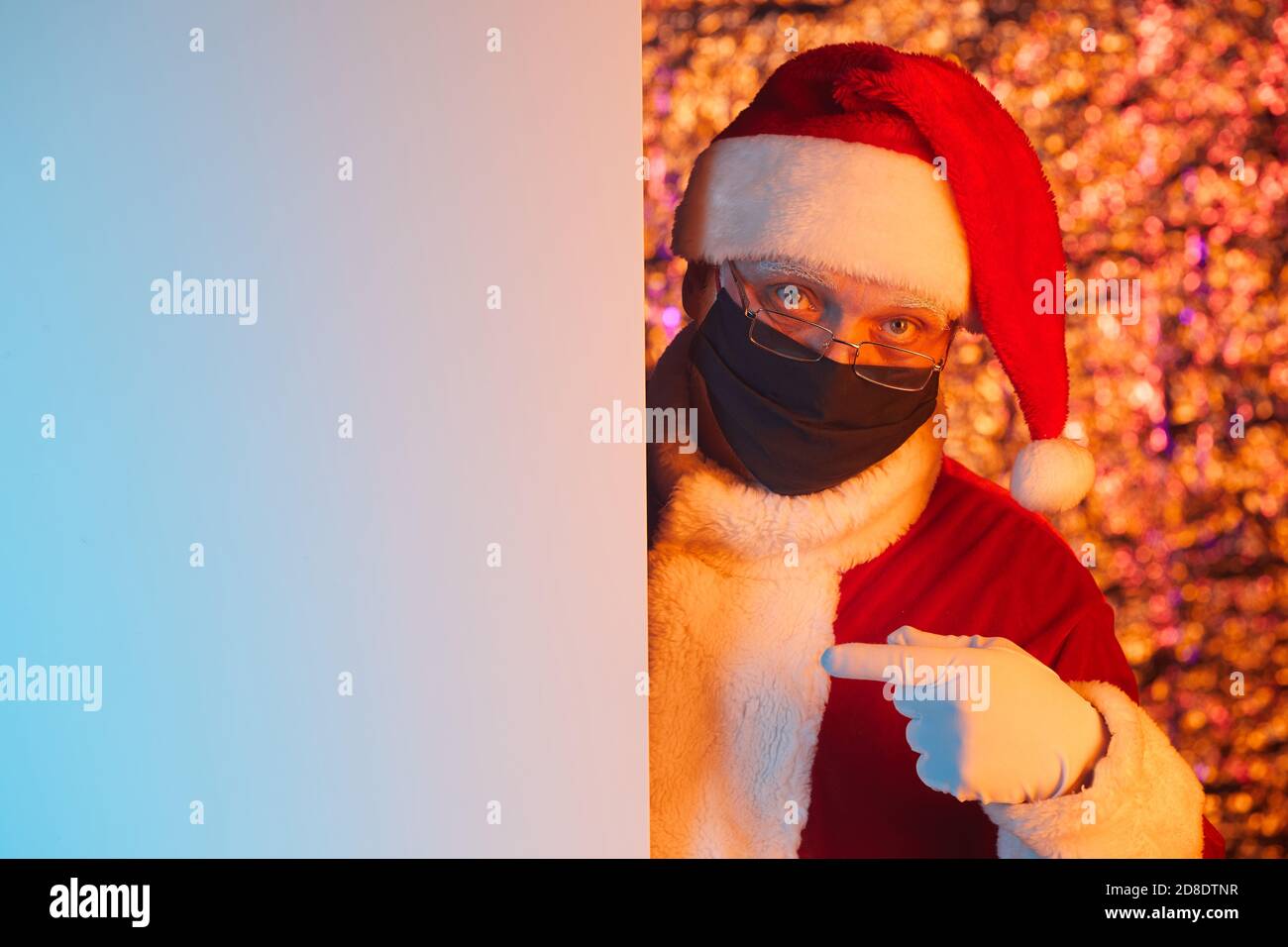 Santa claus holding something hi-res stock photography and images - Alamy