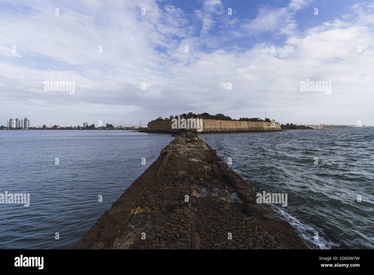 Old long stone path through the ocean Stock Photo - Alamy