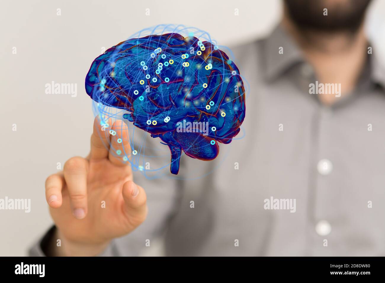 Man in a shirt pointing to a brain - human brain innovation concept ...
