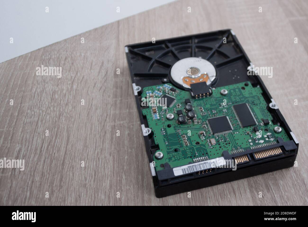 Disassembled computer hard drive device close-up. Dismantling ...