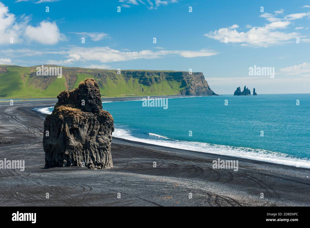Beautiful rock formation on a black volcanic beach at Cape Dyrholaey ...