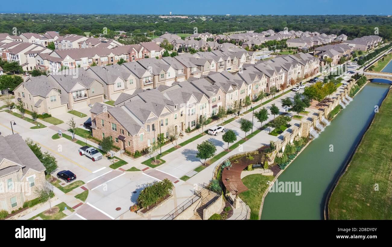 New development riverside townhomes and apartment complex in downtown Flower Mound, Texas, USA ...