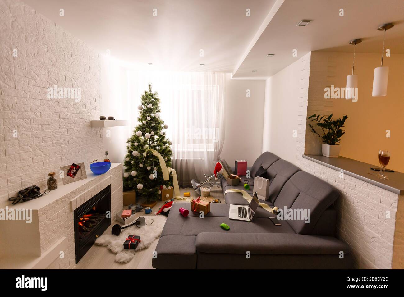Messy living room interior with Christmas tree. Chaos after party Stock ...