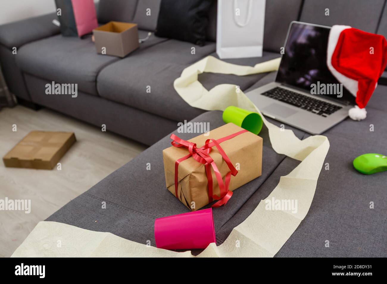 Messy living room interior with Christmas tree. Chaos after party Stock ...