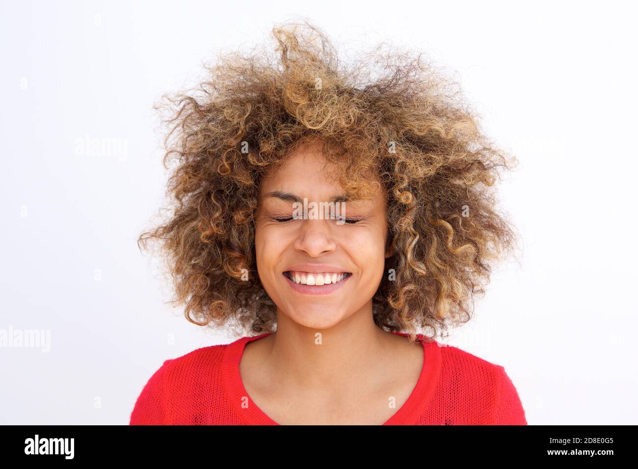 Embarrassed african woman smiling hi-res stock photography and images ...