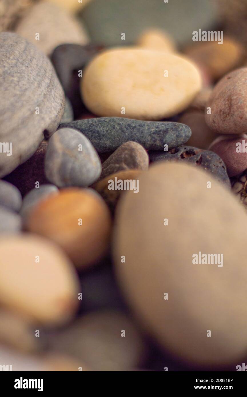 Top view of pebble stones in various colors Stock Photo - Alamy