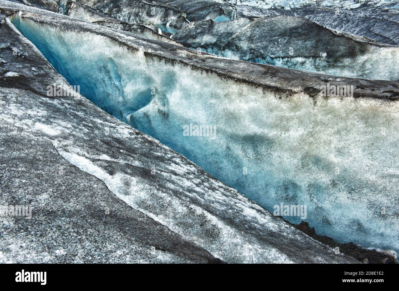 Detailed photo of the Icelandic dirty glacier ice with a incredibly ...