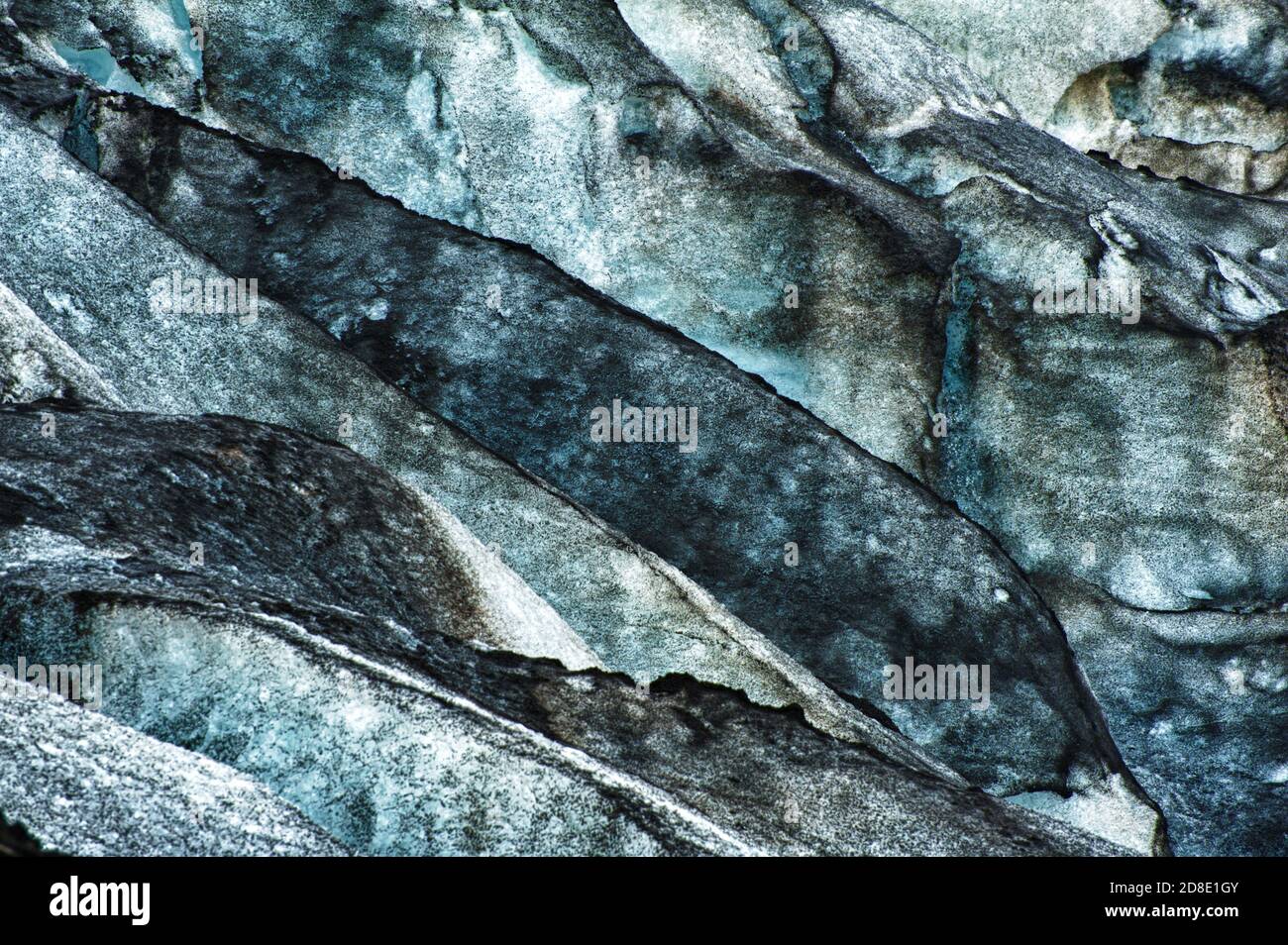 Detailed photo of the Icelandic dirty glacier ice with a incredibly ...