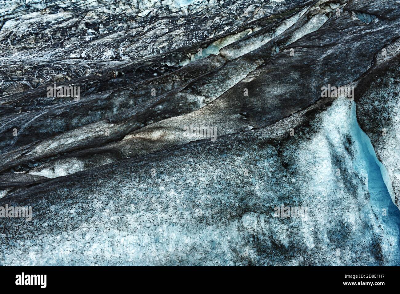 Detailed photo of the Icelandic dirty glacier ice with a incredibly ...