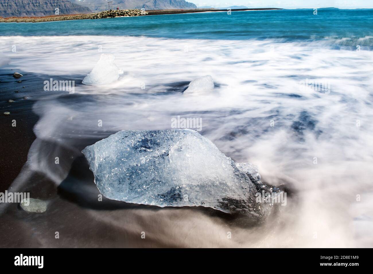 Beautiful beach in the South of Iceland with a black lava sand is full ...