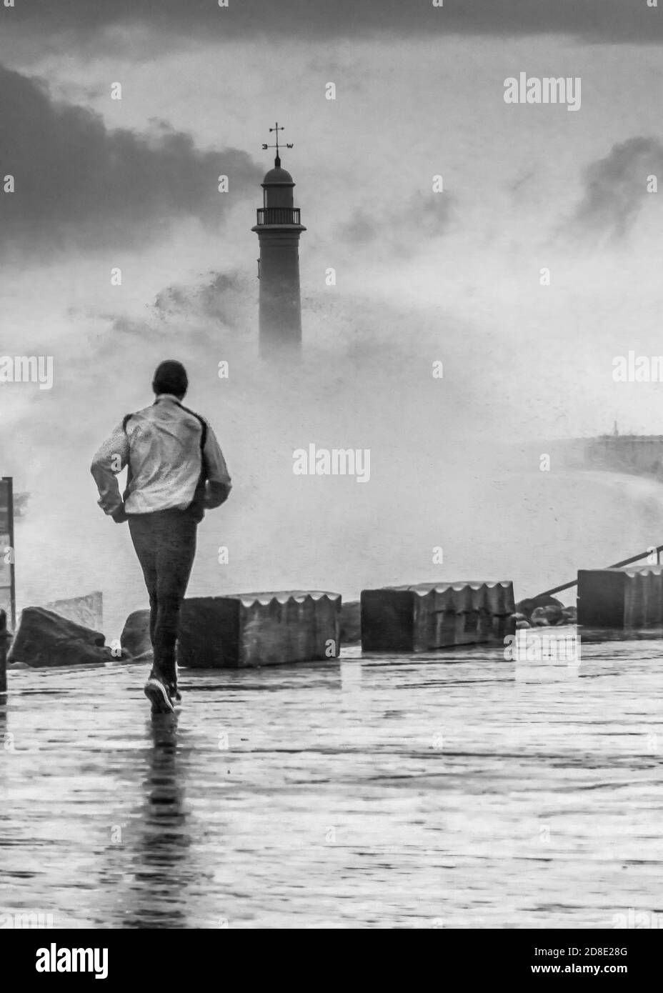 Cool Running - Man running in a storm as waves crash over the ...
