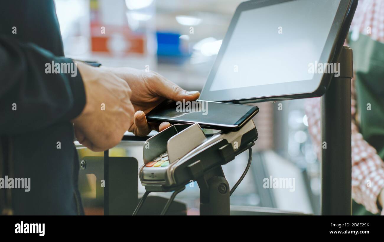 Man cash register hi-res stock photography and images - Alamy