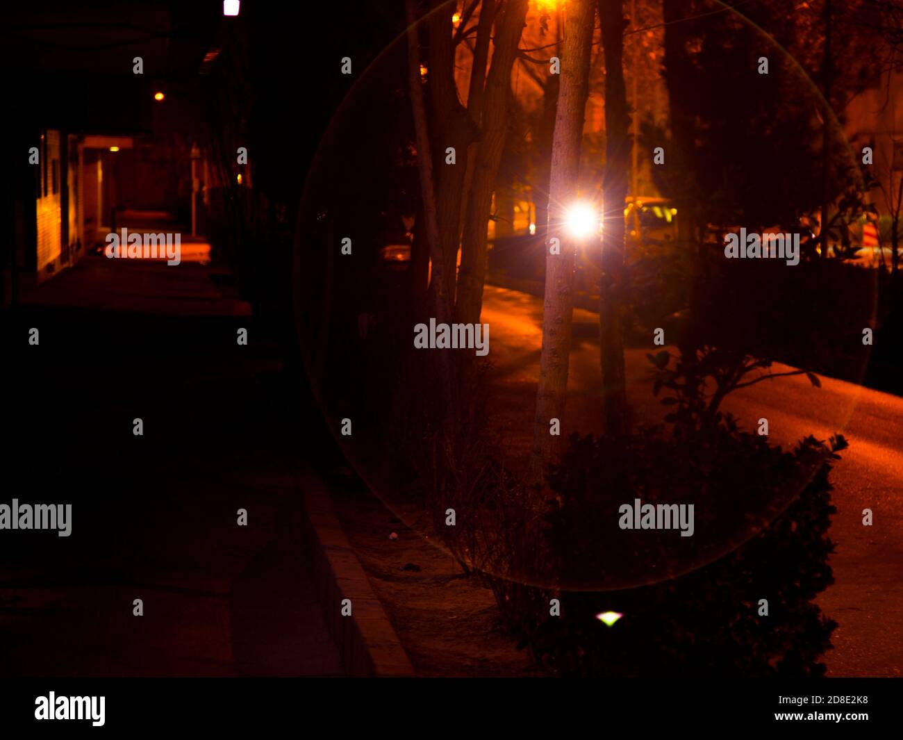 car light flare at night Stock Photo - Alamy