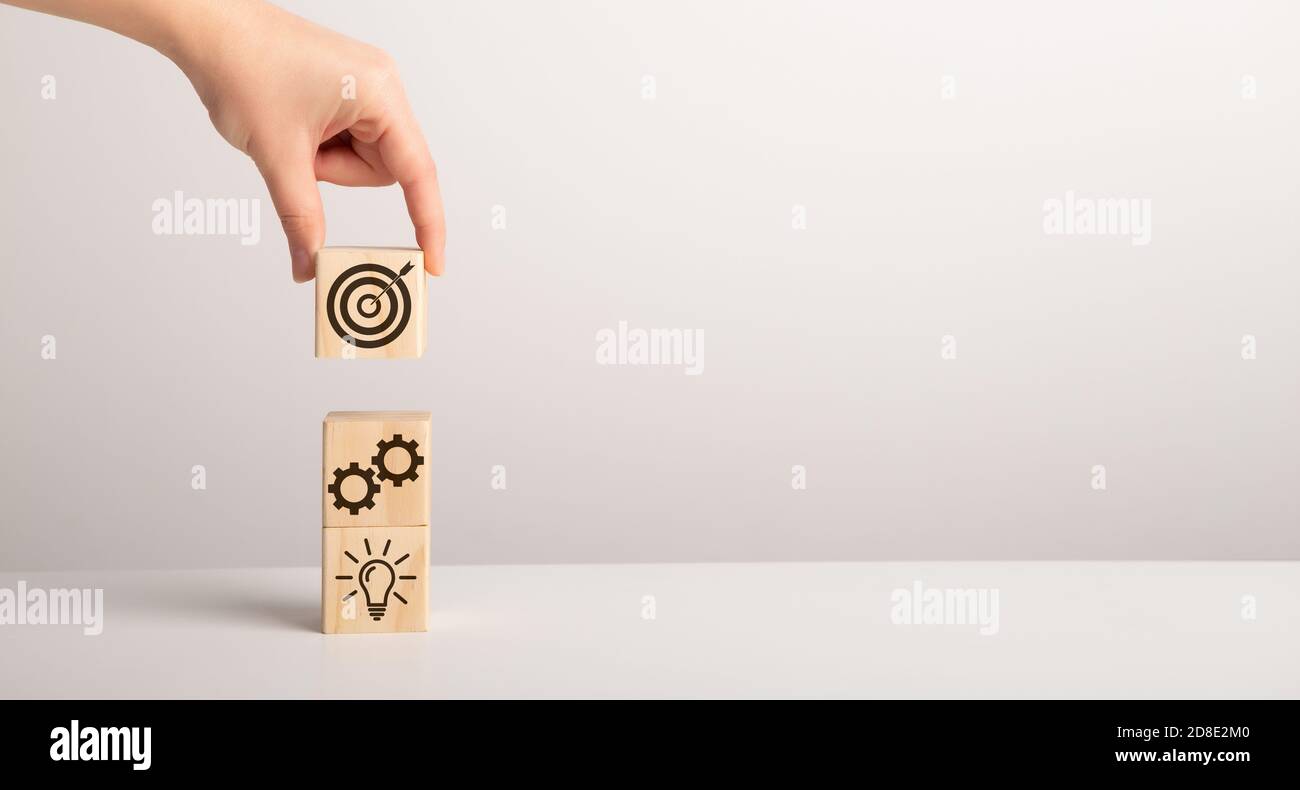 Hand Putting Wooden Blocks With Picture Of Target, Gray Background ...