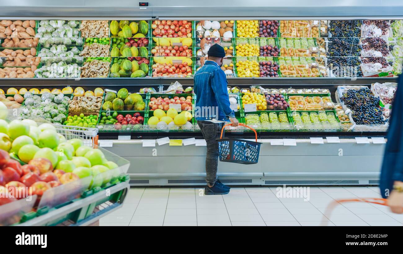 At the Supermarket: Happy Black Stylish Guy with Shopping Basket ...