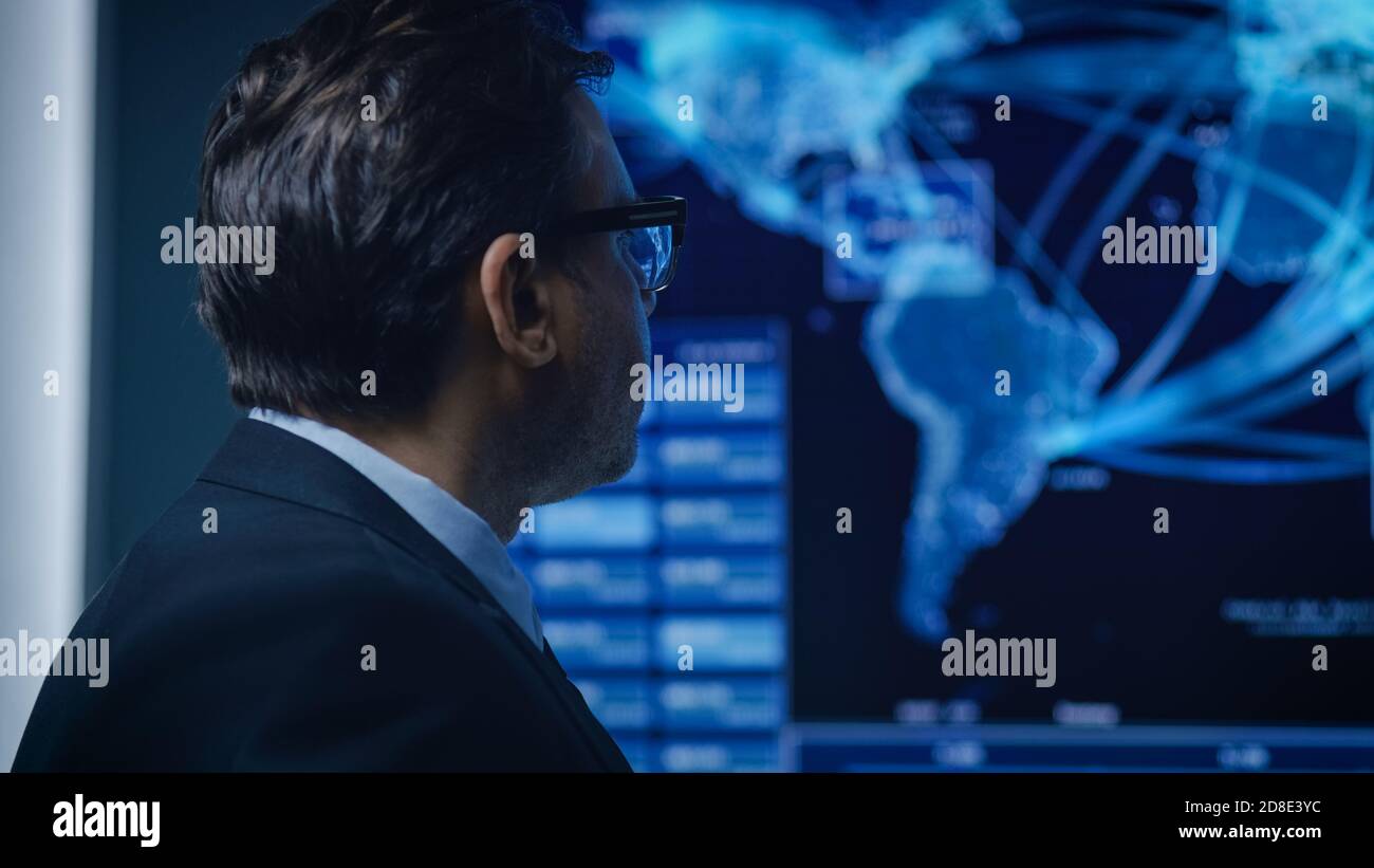 Portrait Shot of the Special Agent in Charge Looking at Satellite ...