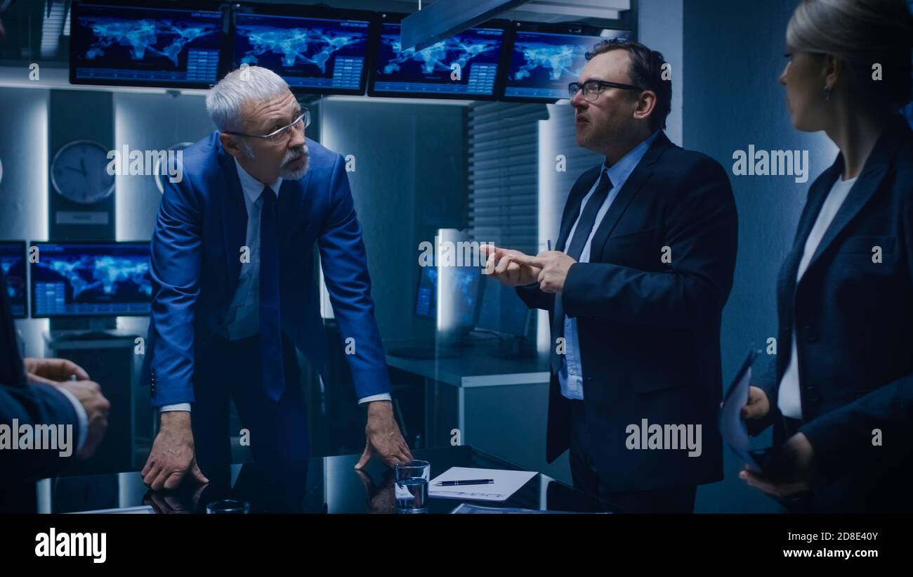 Fbi officials at conference table hi-res stock photography and images ...