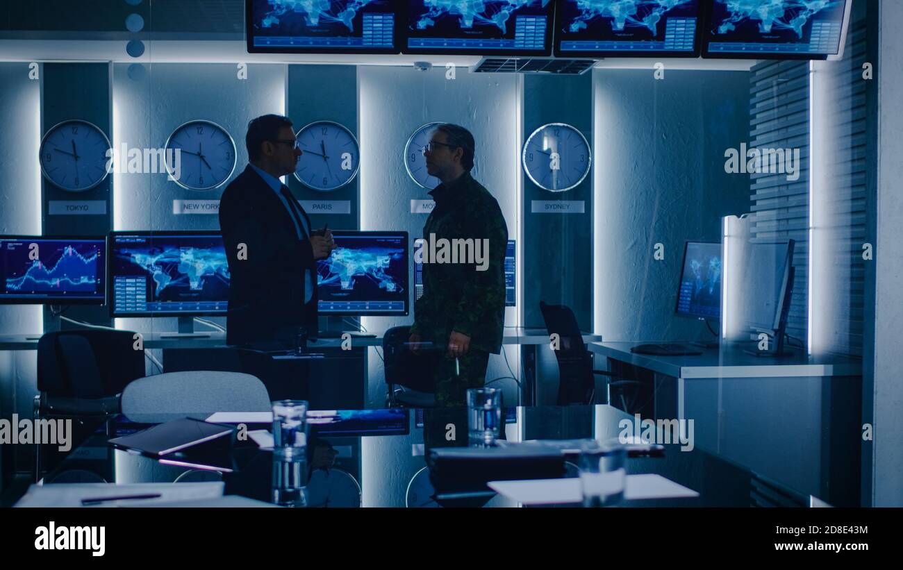 Federal Special Agent Talks To Military Man in the Monitoring Room. In ...