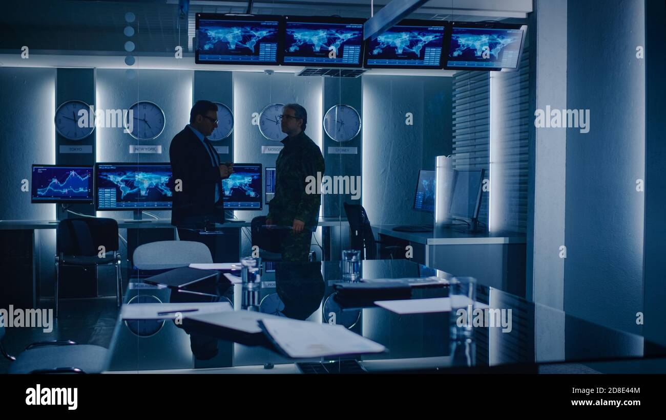 Federal Special Agent Talks To Military Man in the Monitoring Room. In ...