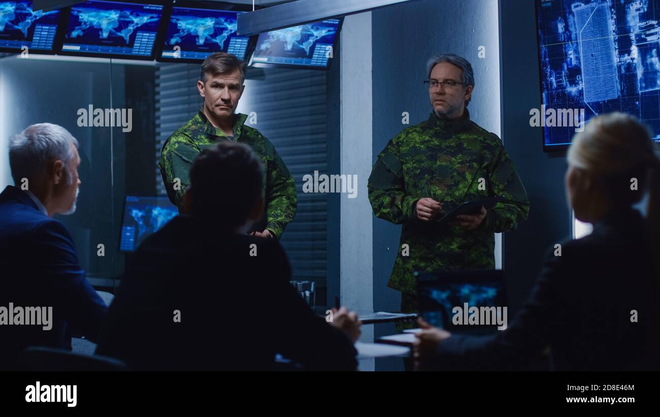 High-Ranking Military Men holds a Briefing to a Team of Government ...