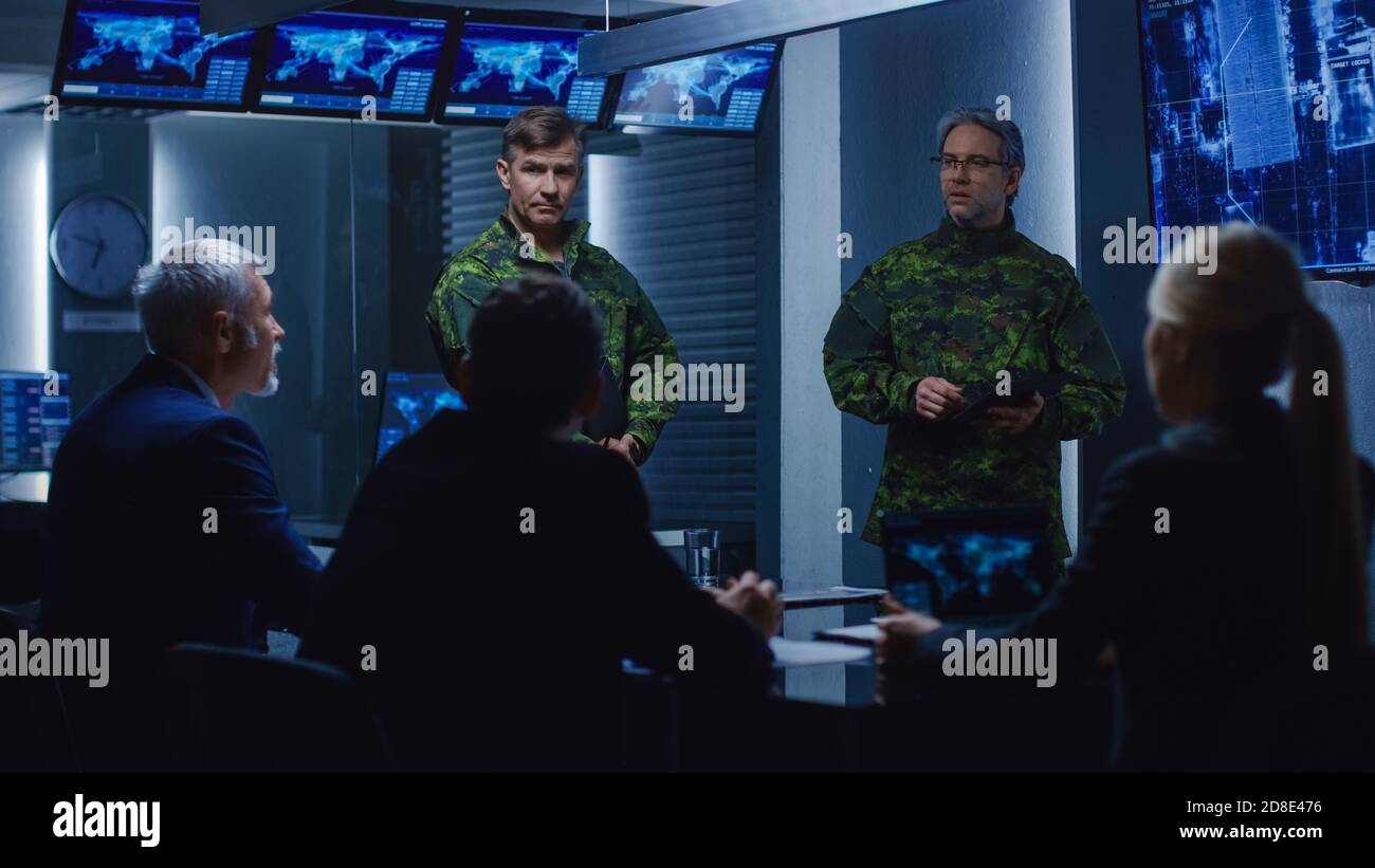 High-Ranking Military Men holds a Briefing to a Team of Government ...