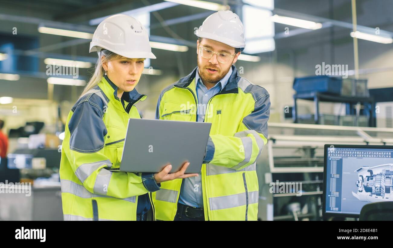 Engineer using laptop hi-res stock photography and images - Alamy