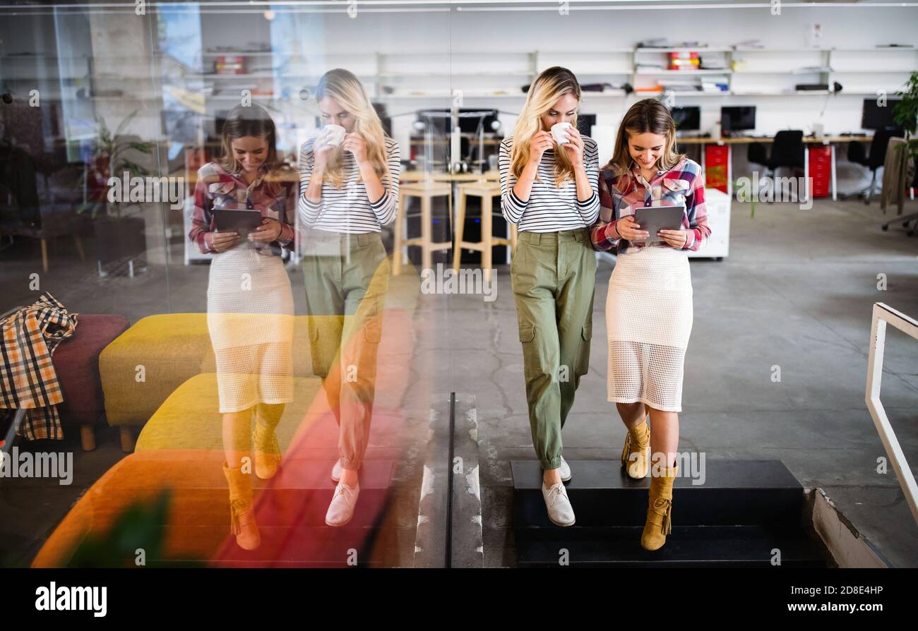 Business people having fun and chatting at workplace office Stock Photo ...