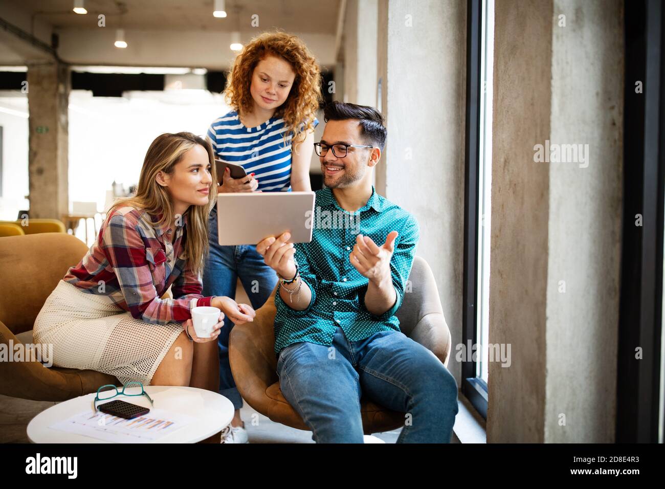 Happy creative team in office. Business, startup, design, people and ...