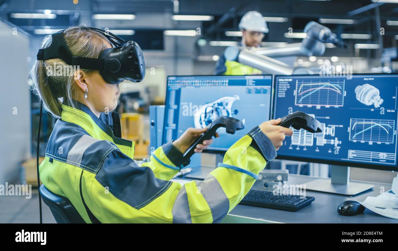 Factory: Female Industrial Engineer Wearing Virtual Reality Headset and ...