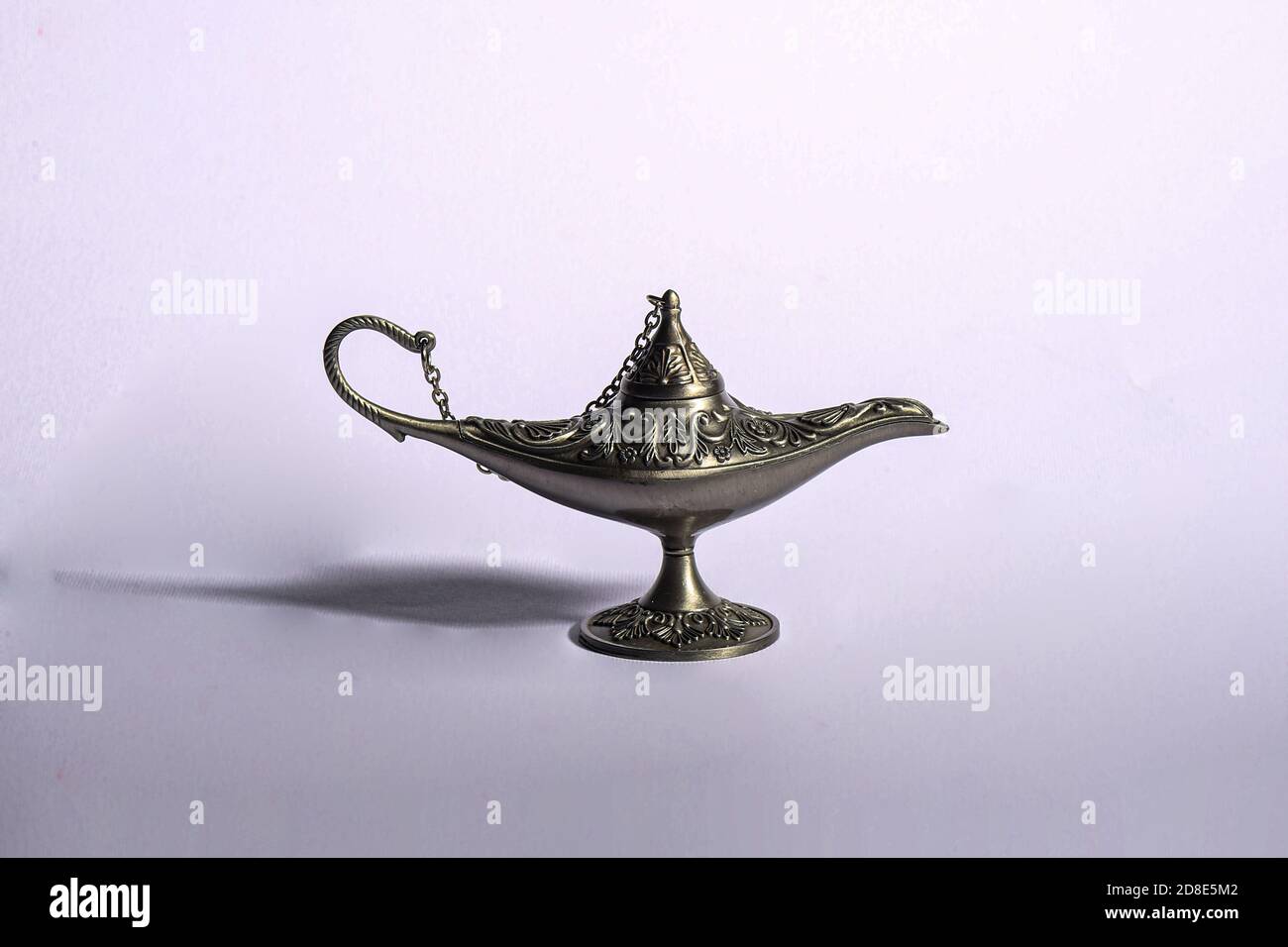 magic lamp on a white background Stock Photo - Alamy