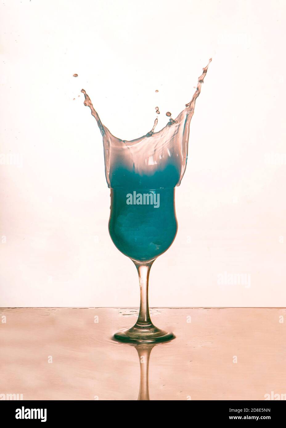 splashing blue juice in a glass Stock Photo - Alamy