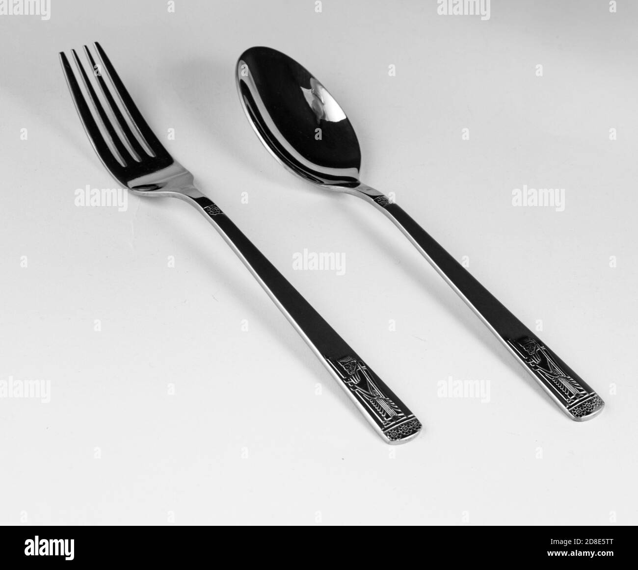a fork and a spoon in studio Stock Photo - Alamy