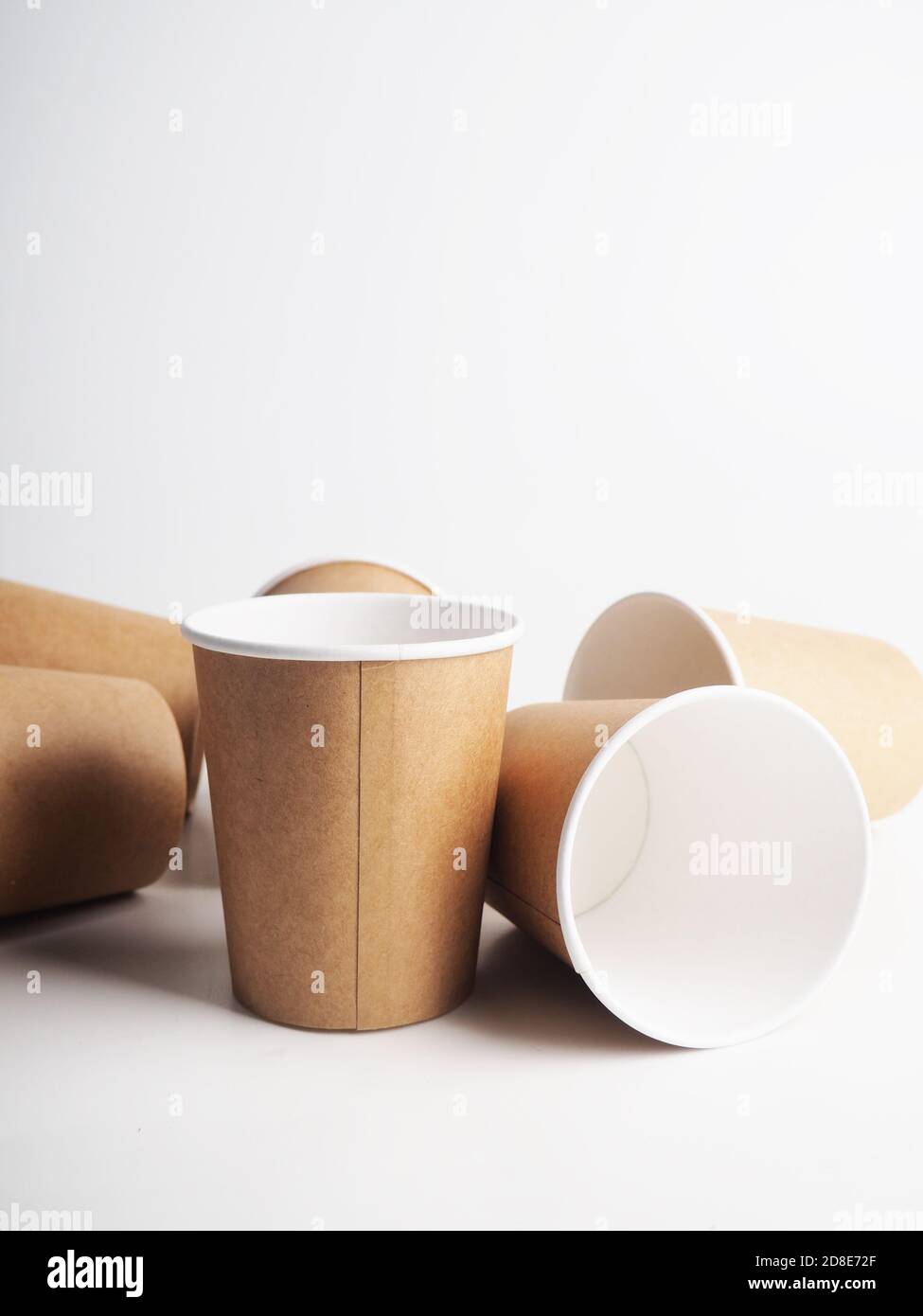 a few empty paper cups. Zero waste concept, paper tableware. Paper cup ...