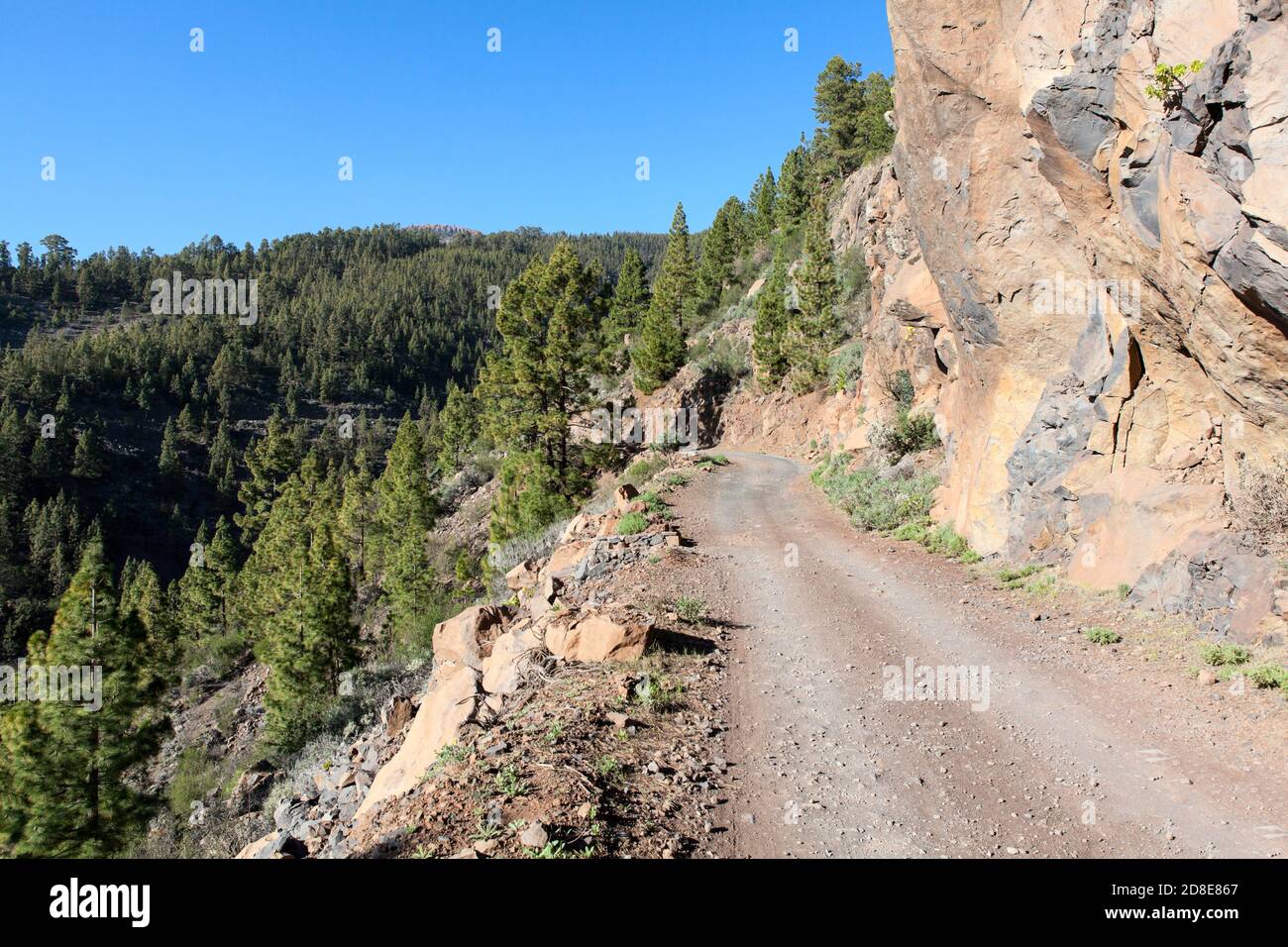 High altitude unsurfaced road is in mountains of Tenerife island ...