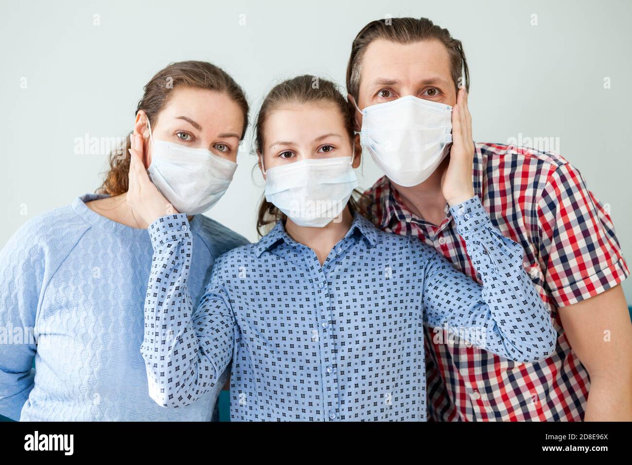 Three people Caucasian family with dad, mom and daughter staying at ...