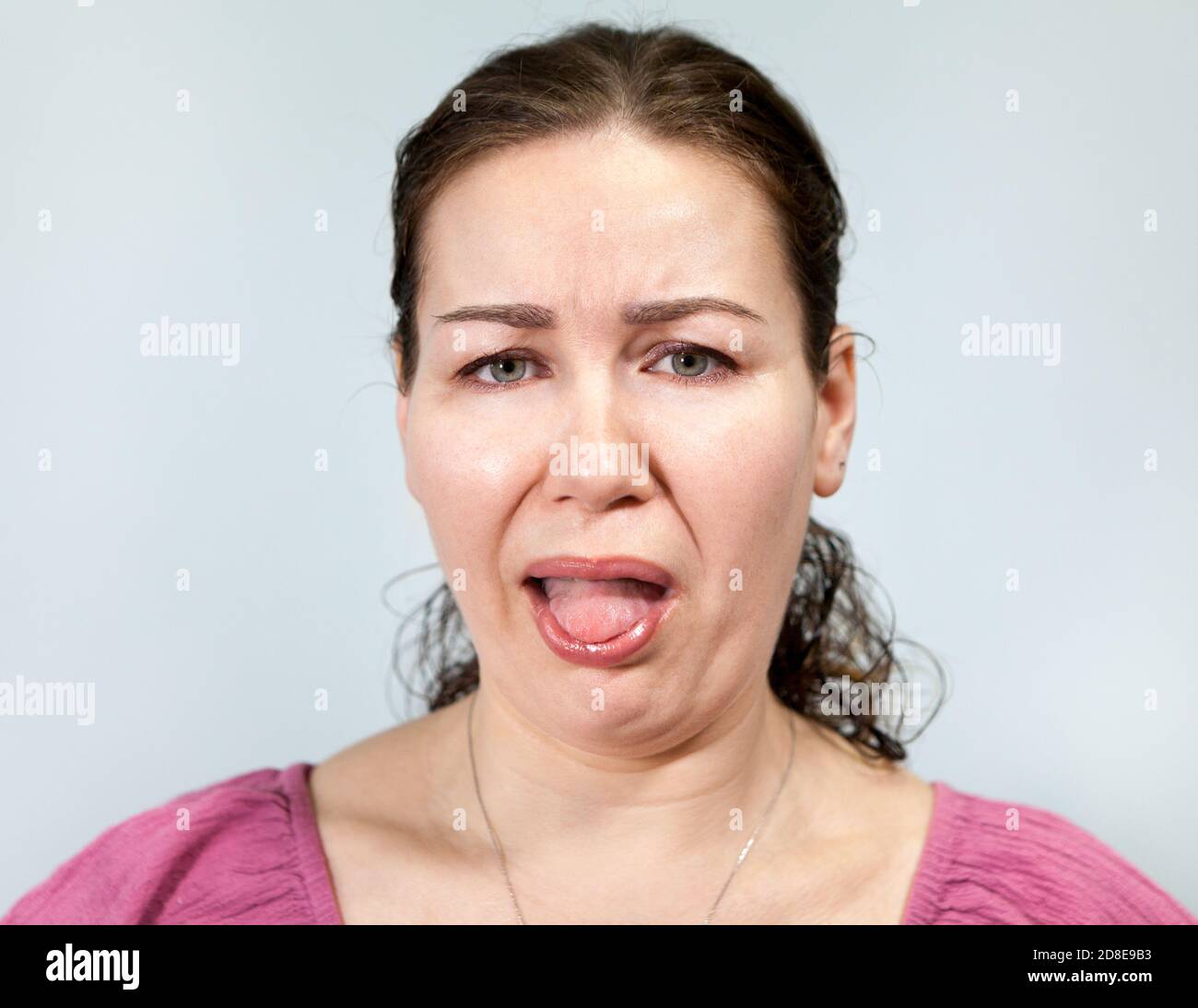 Disgust face tongue hi-res stock photography and images - Alamy