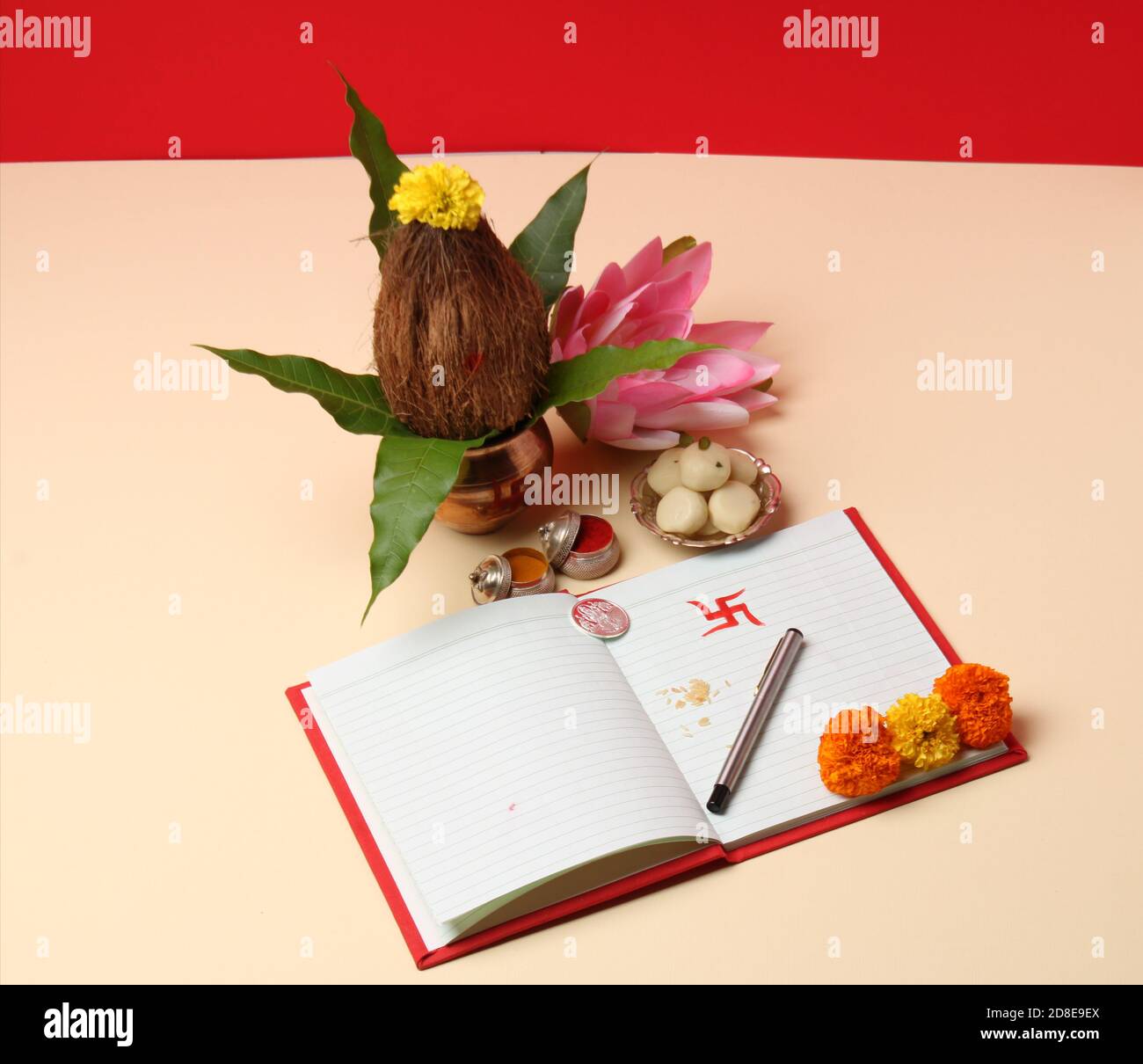 Red accounting note book / bahi khata with copper kalash, sweets ...
