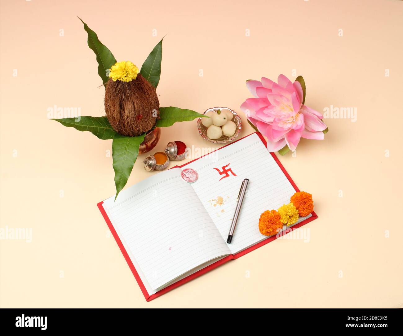 Red accounting note book / bahi khata with copper kalash, sweets ...