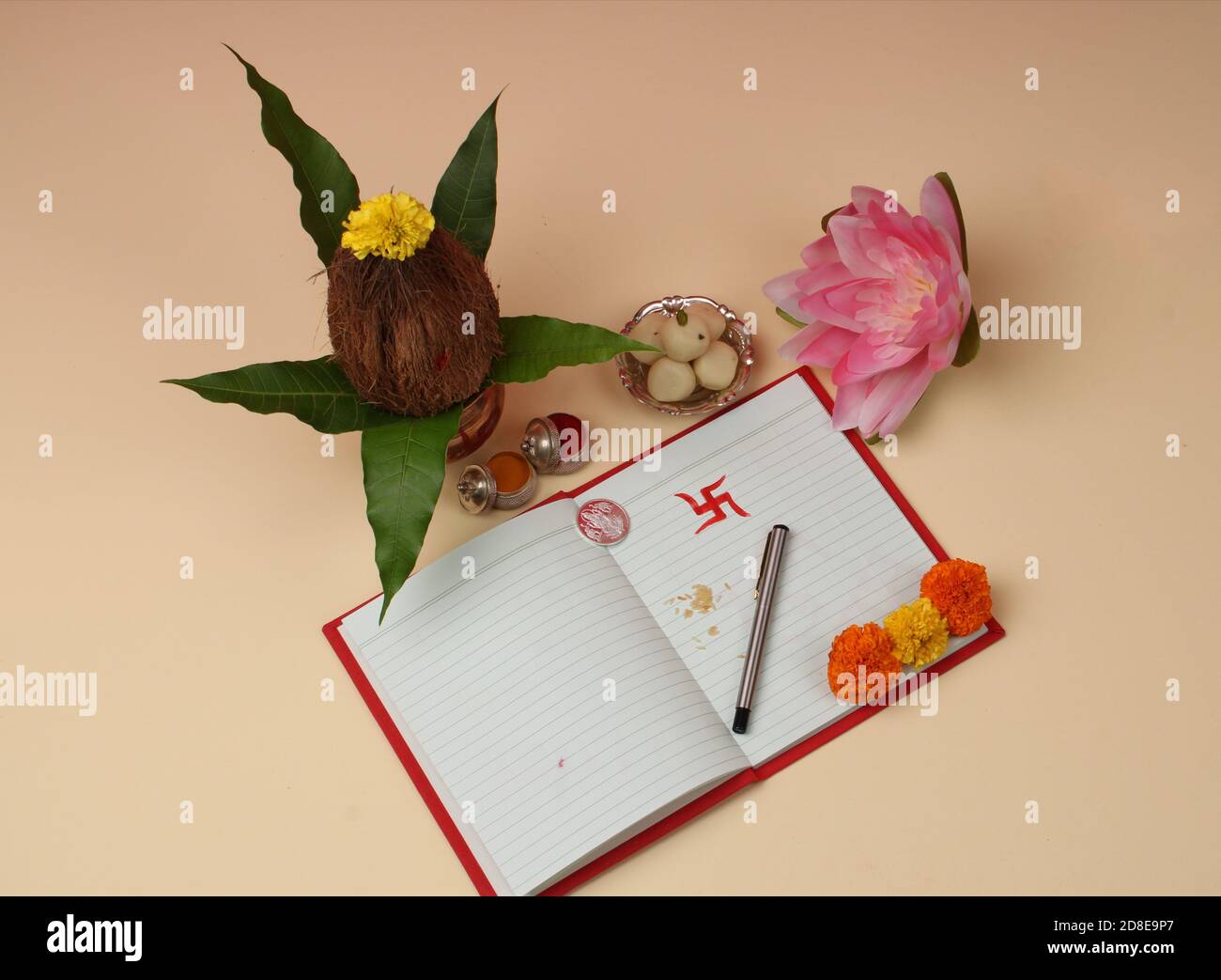 Red accounting note book / bahi khata with copper kalash, sweets ...