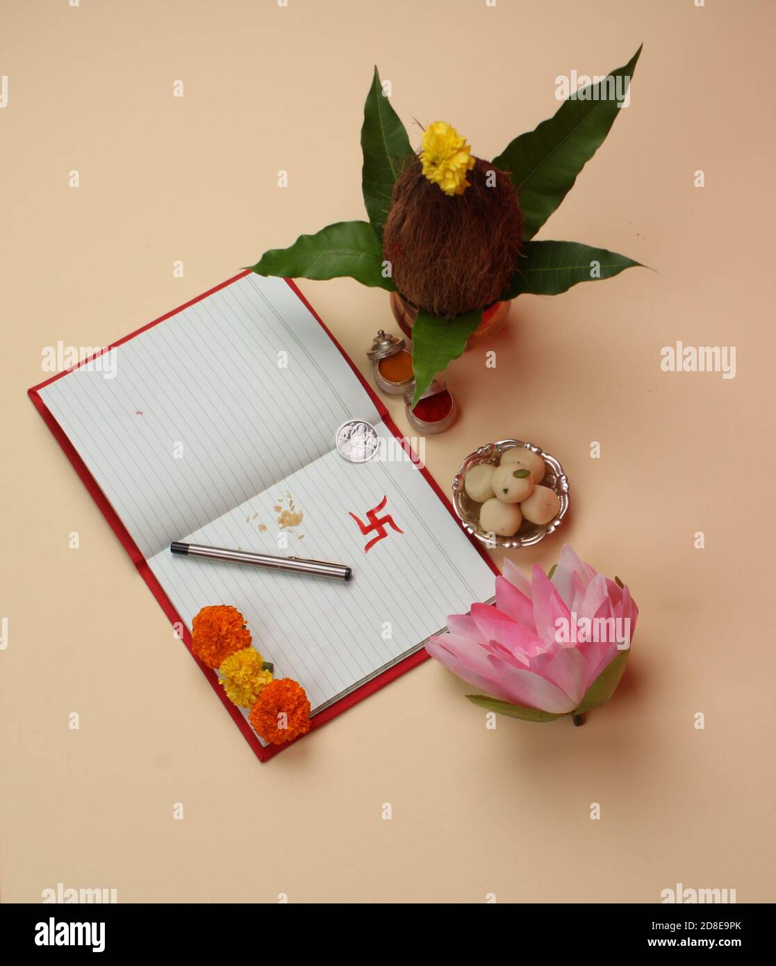 Red accounting note book / bahi khata with copper kalash, sweets ...