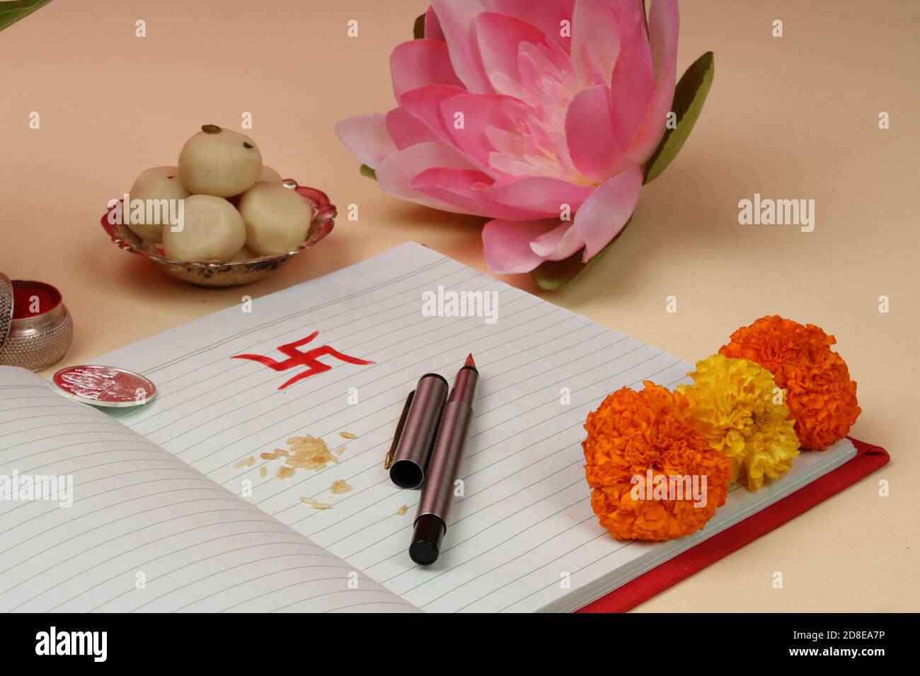 Red accounting note book / bahi khata with copper kalash, sweets ...