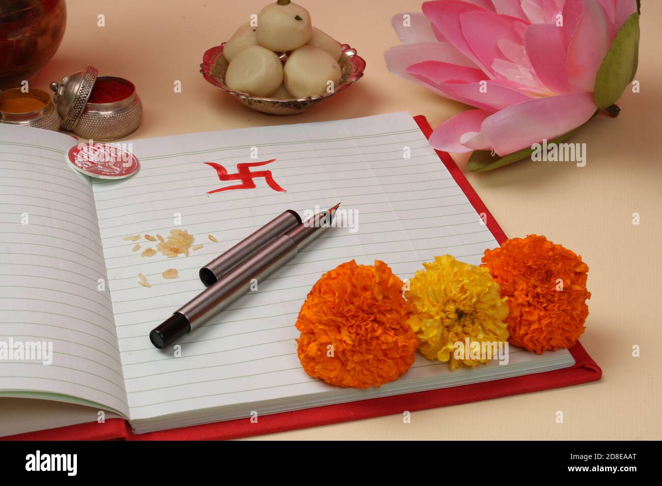 Red accounting note book / bahi khata with copper kalash, sweets ...